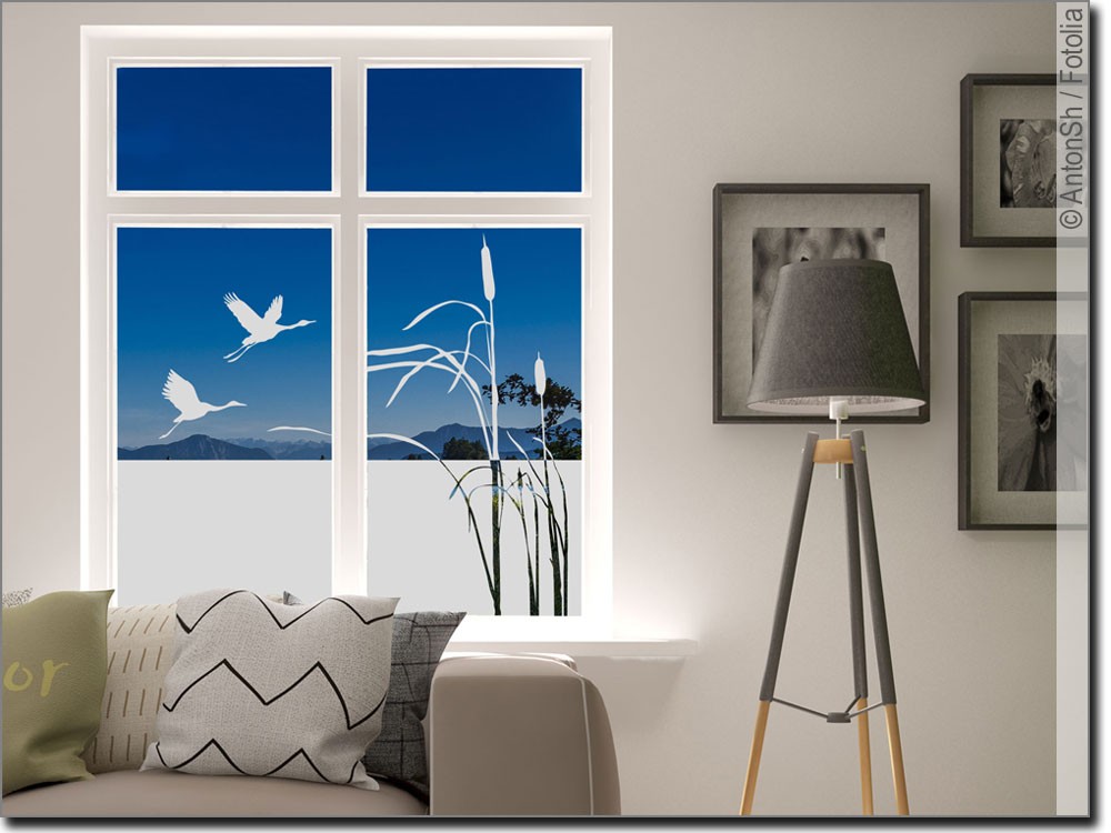 Fensterfolie Störche im Schilf